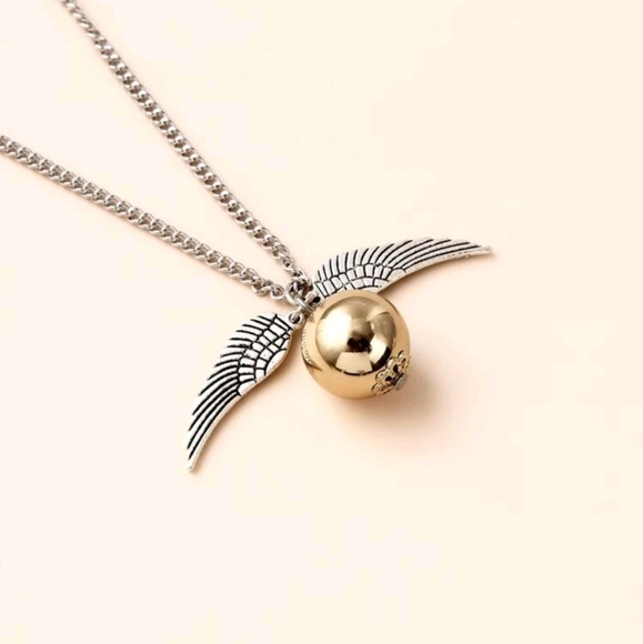 Warner Bros. | Jewelry | Left Harry Potter Golden Snitch Necklace ...
